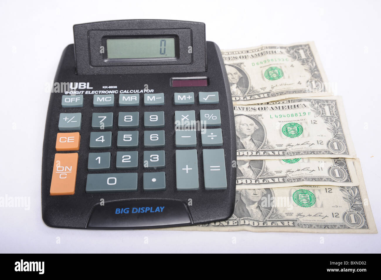 Calculator and Dollar Notes Stock Photo - Alamy