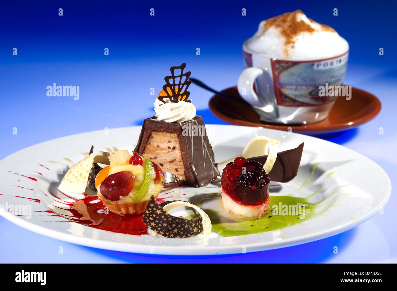 The mini desserts w cup of coffee Stock Photo - Alamy