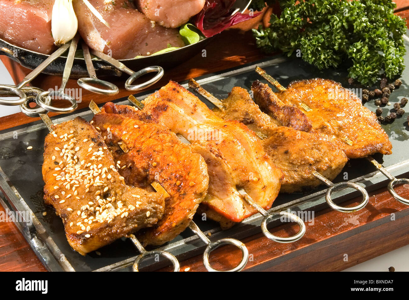 specialty of Mexican and Aztec cuisine pork on spits Stock Photo - Alamy