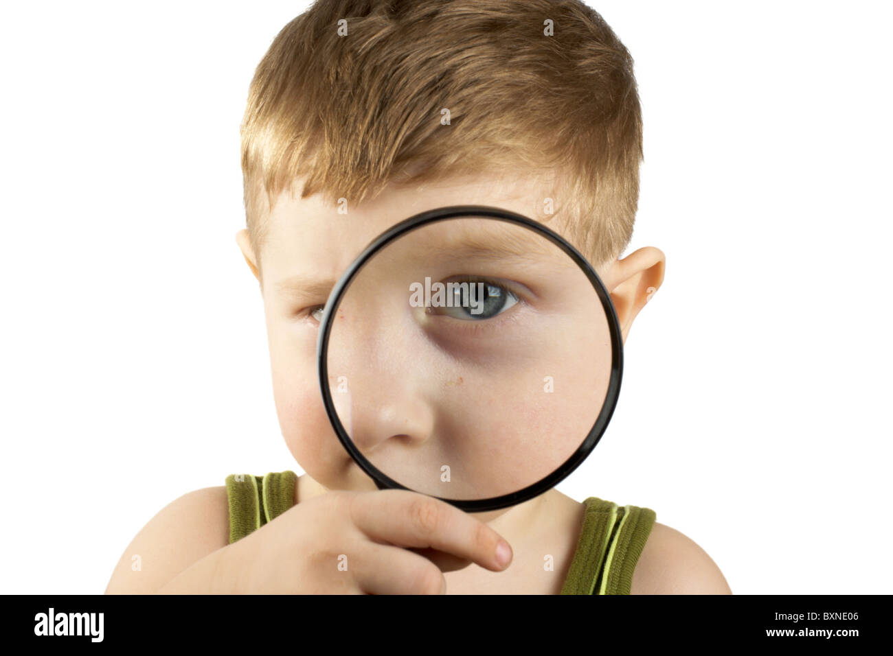 Kid using magnifying glass isolated on white background Stock Photo - Alamy