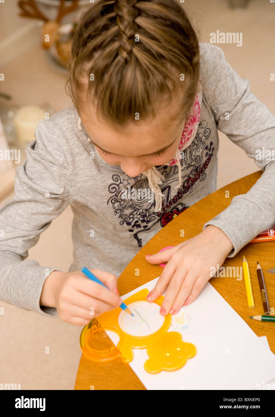 A Child Drawing at Home Stock Photo - Alamy