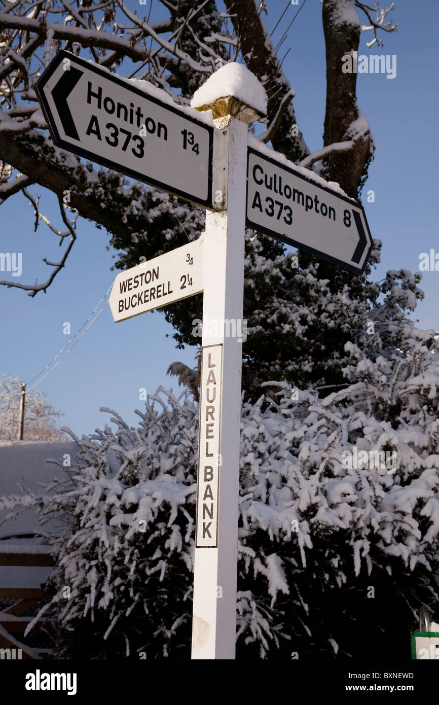 Snow covered signpost on the A373 in East Devon Stock Photo - Alamy