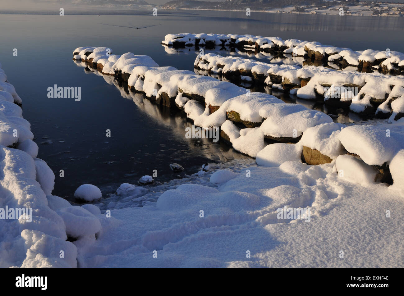 Stone pier, winter, snow, frozen sea, landscape Stock Photo - Alamy