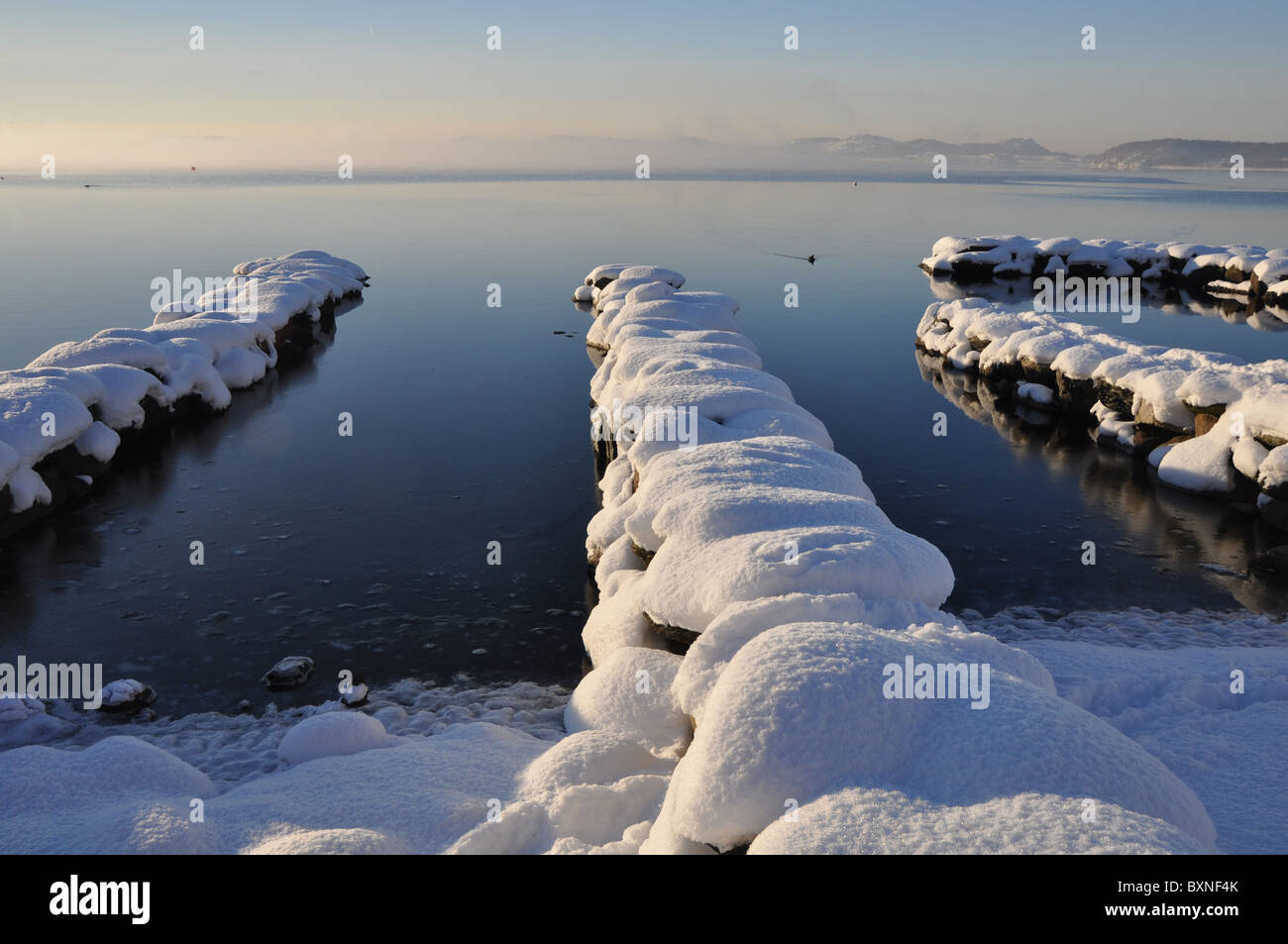 Stone pier, winter, snow, frozen sea, landscape Stock Photo - Alamy