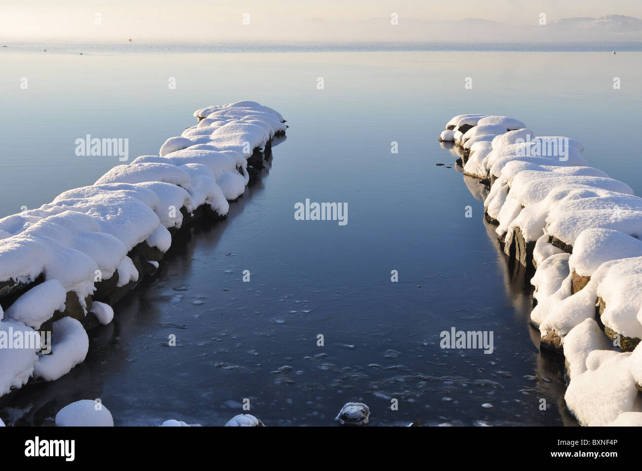 Stone pier, winter, snow, frozen sea, landscape Stock Photo - Alamy