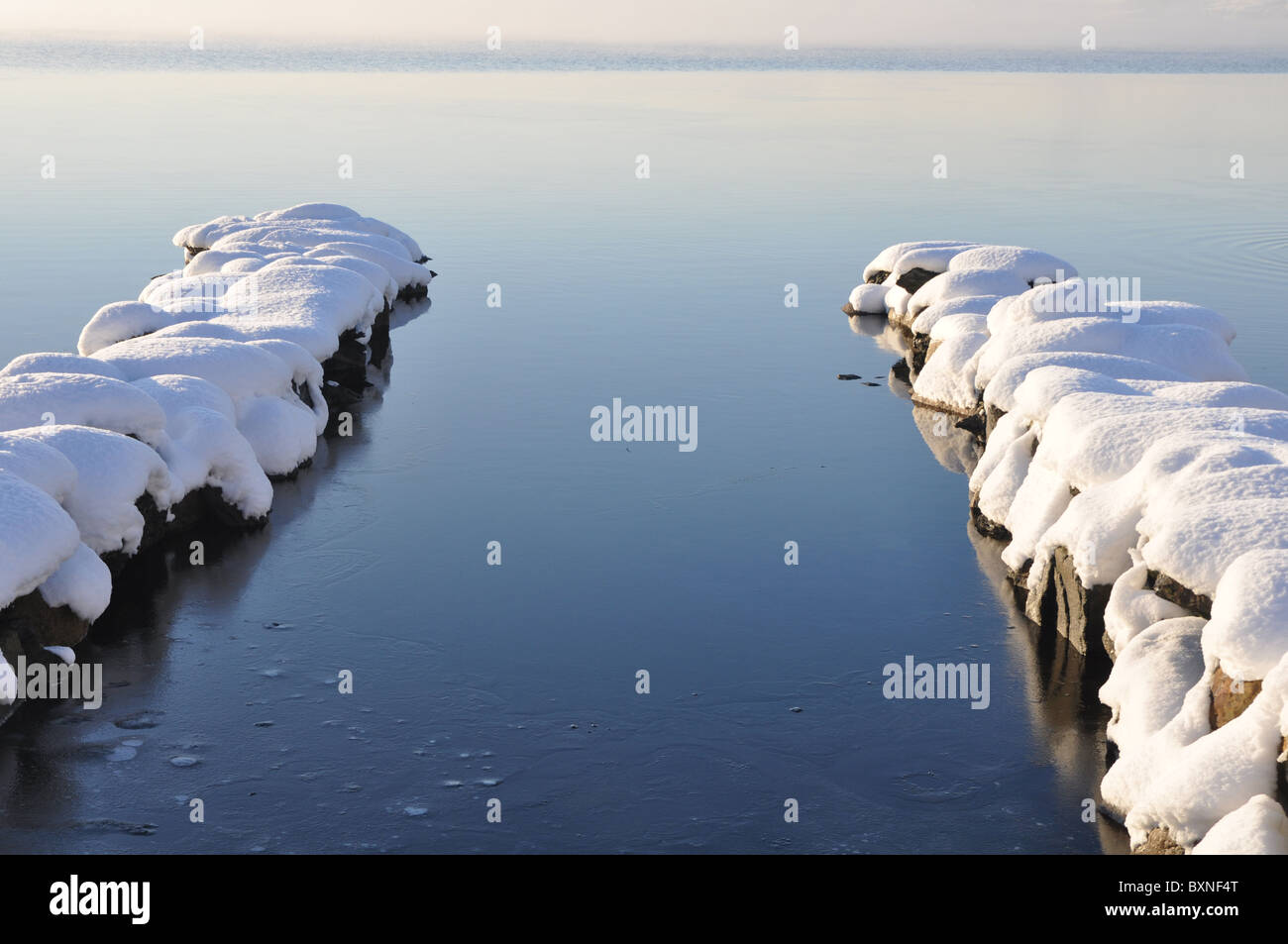 Stone pier, winter, snow, frozen sea, landscape Stock Photo - Alamy