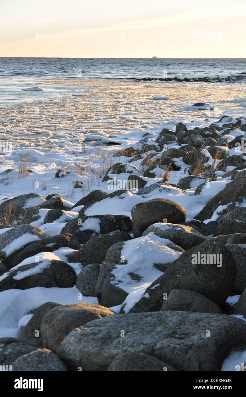 Where river meets the sea, winter, low sun, snow, boat houses, light ...