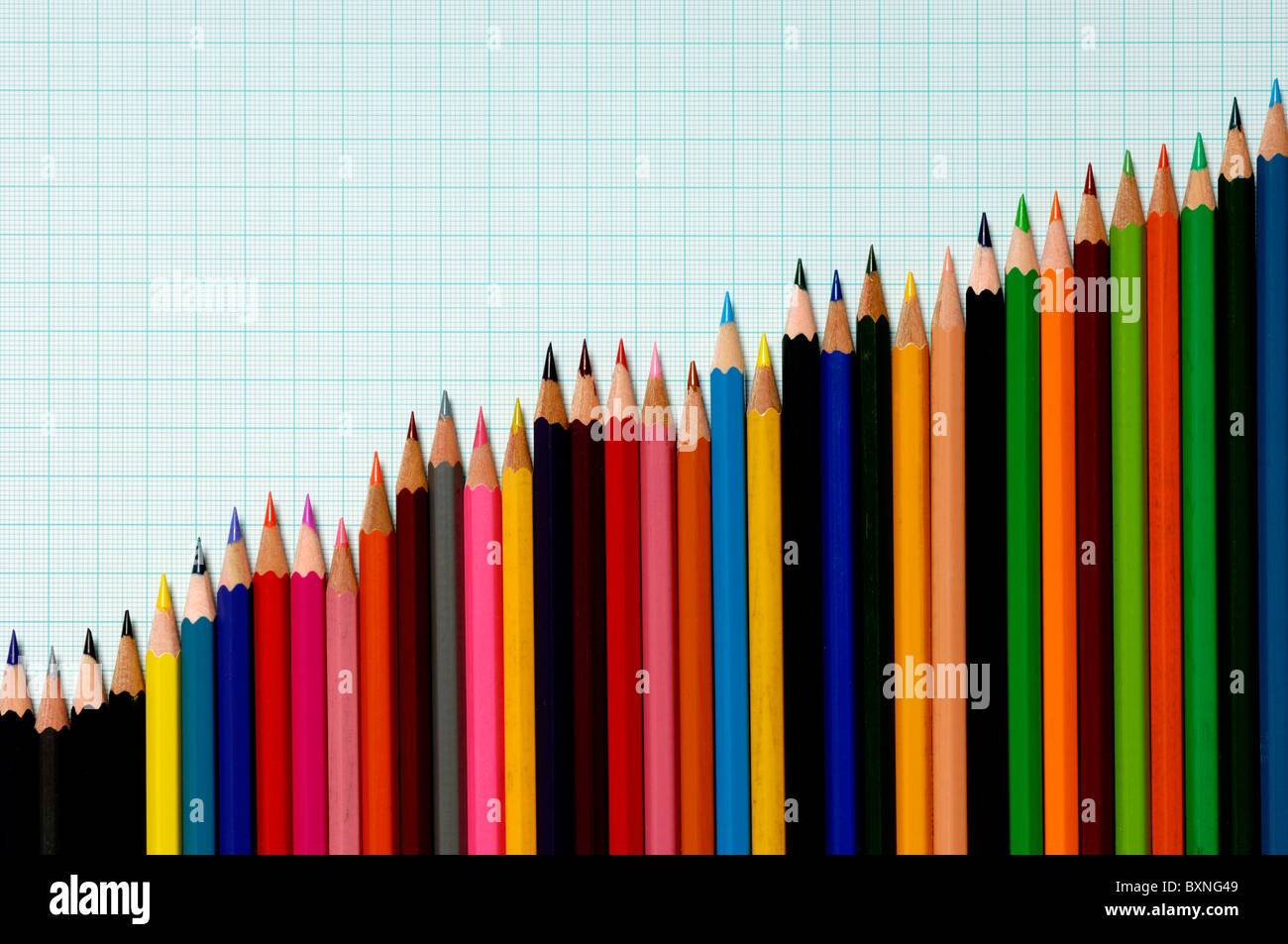 Coloured pencils on a graph Stock Photo - Alamy