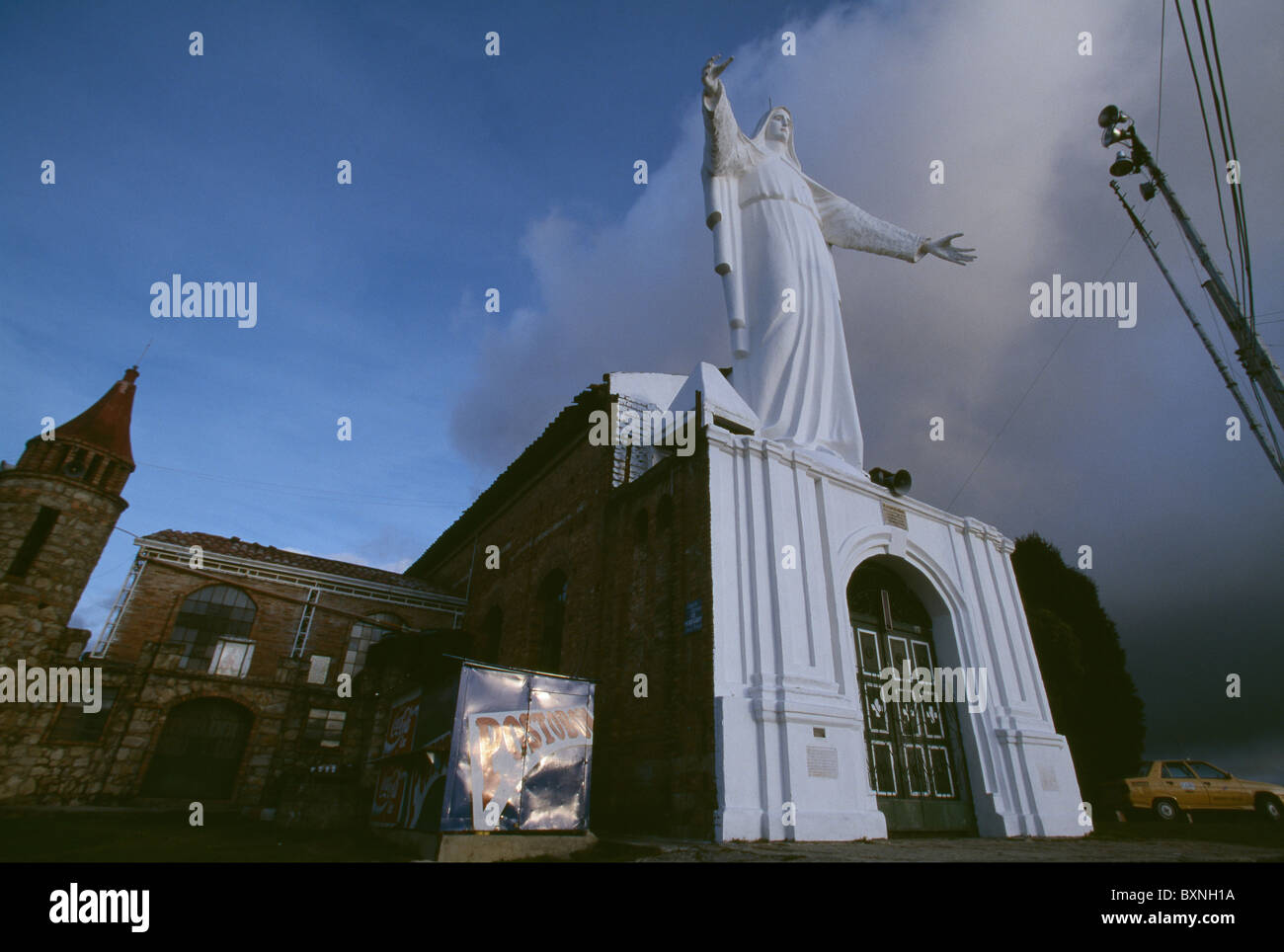 A statue of Christ stands 3160 meters above Bogota, Colombia on Cerro ...