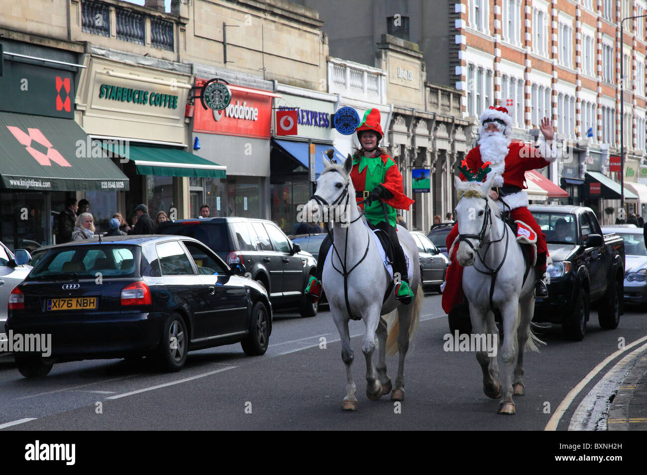 Santa Claus coming on the horse to Wimbledon Surrey England Stock Photo ...