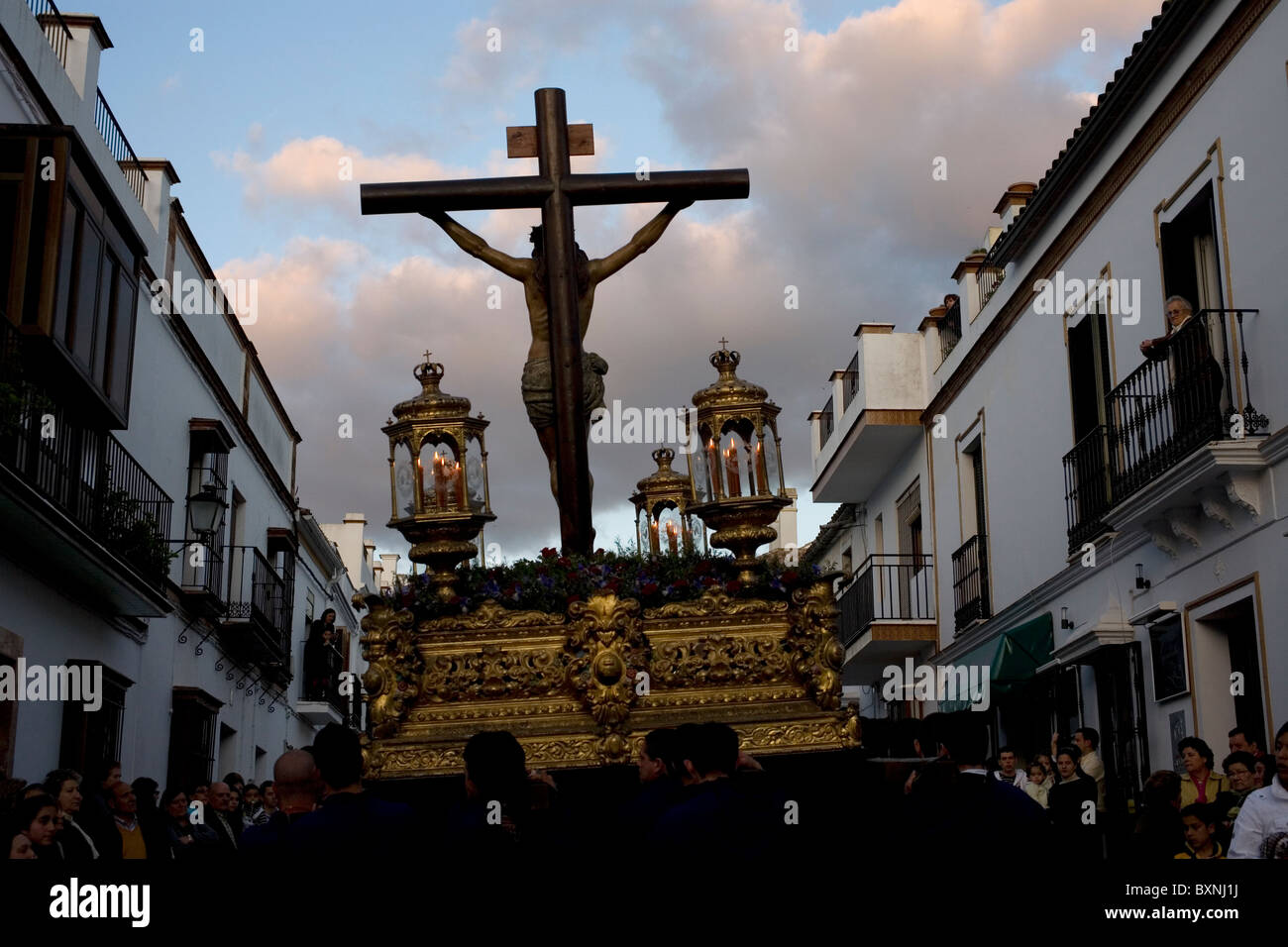 A statue of Jesus crucified is carried during a procession for Easter ...