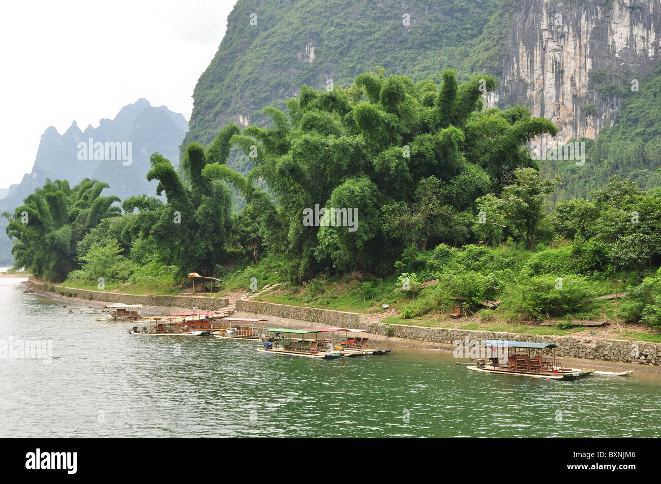 River boats on the Li River with beautiful karst hills in the ...