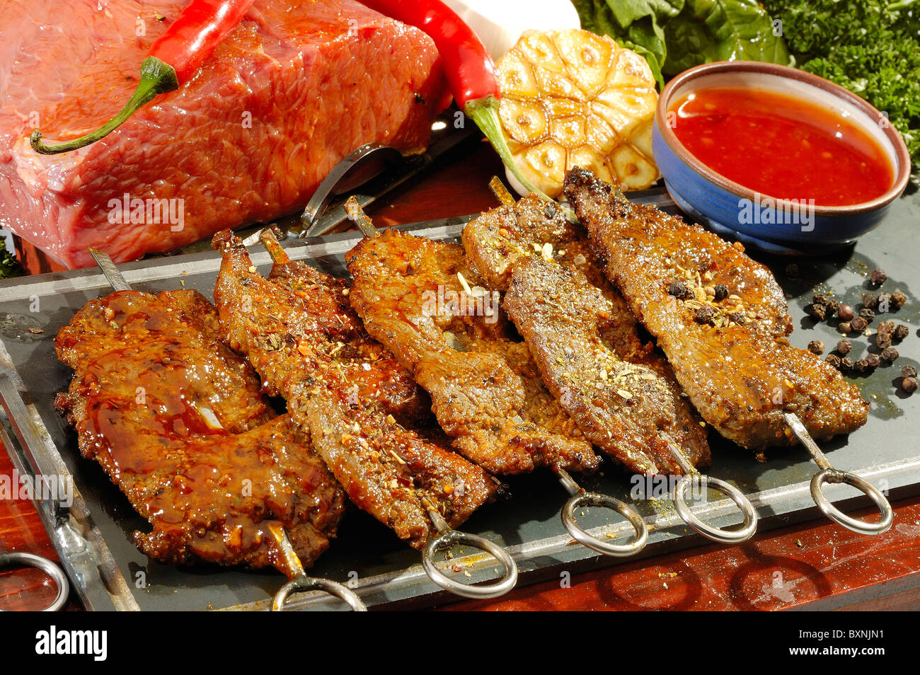specialty of mexican and aztec cuisine beef on spits Stock Photo - Alamy