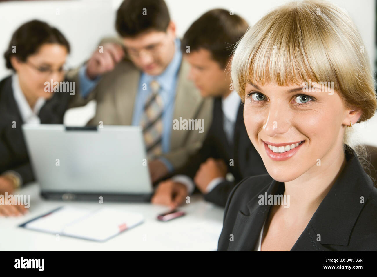 Portrait of beautiful white collar worker on the background of her ...