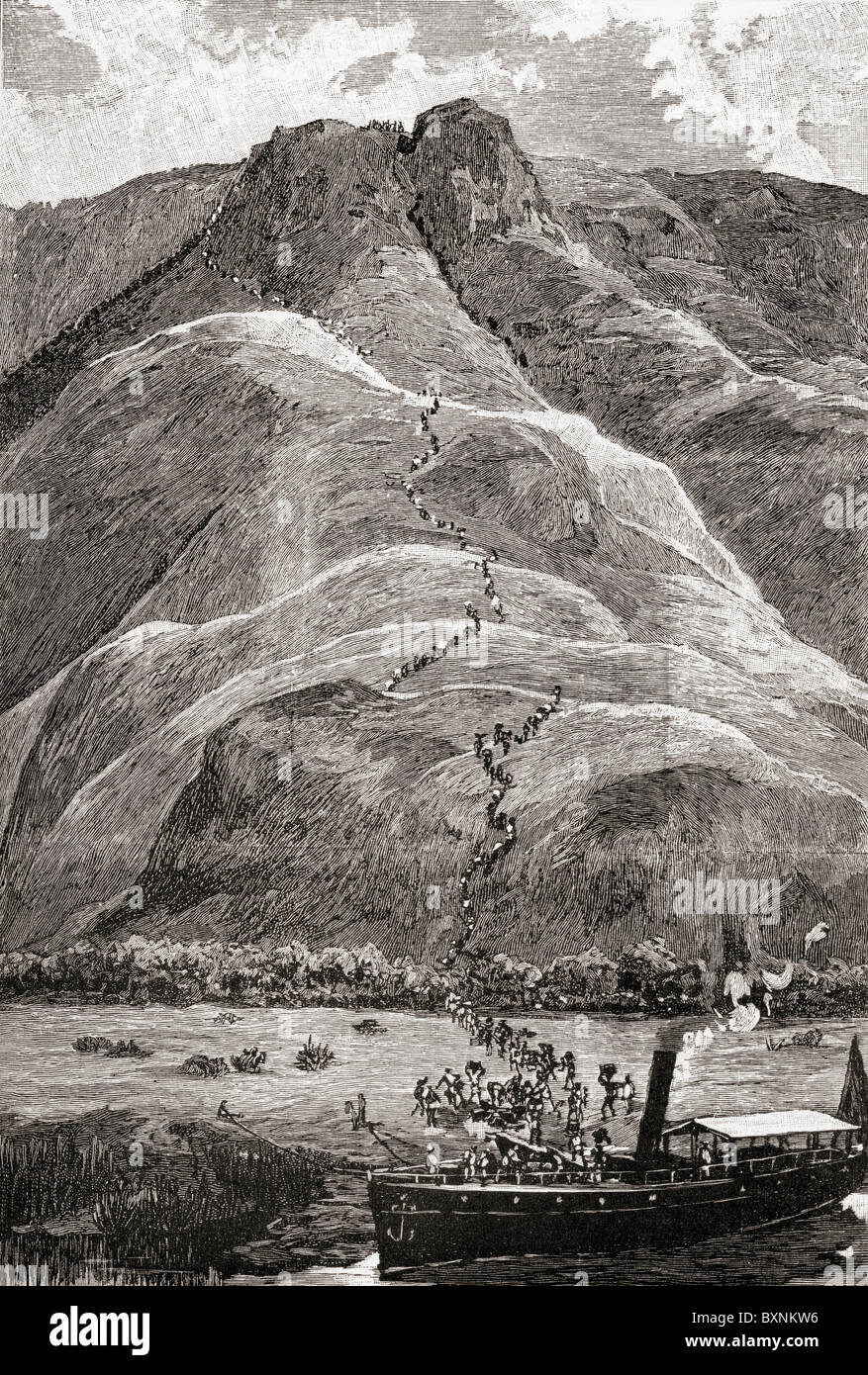 Natives climbing plateau slopes at Kavalli from camp at Lake Albert ...