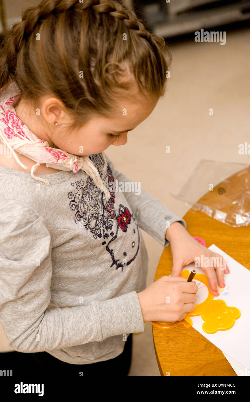 A Child Drawing at Home Stock Photo - Alamy