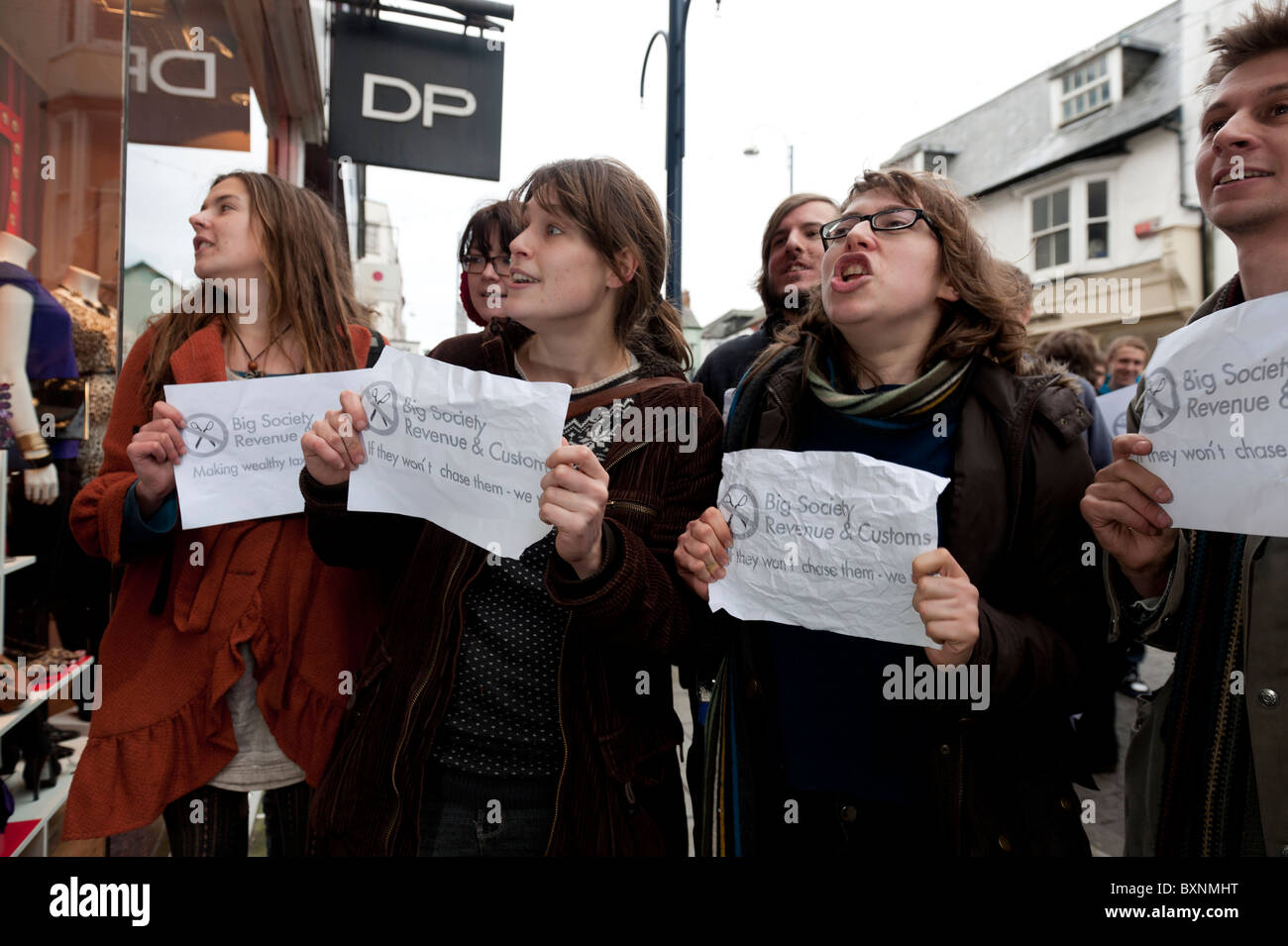 UK Uncut protesters demonstrating at a branch of Dorothy Perkins ...