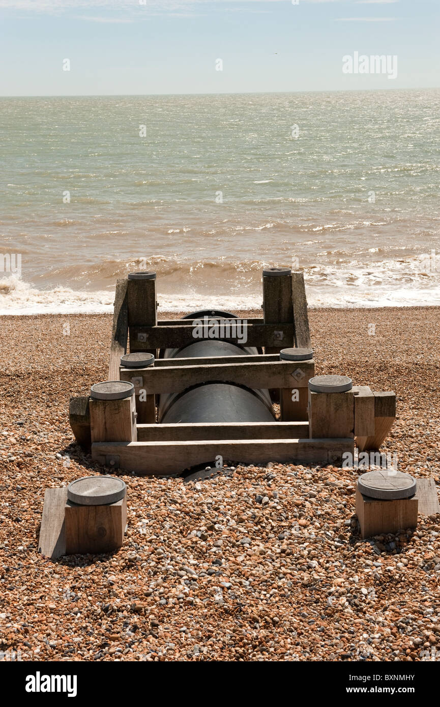Sewerage outlet Water pipe Onto Beach Stock Photo - Alamy