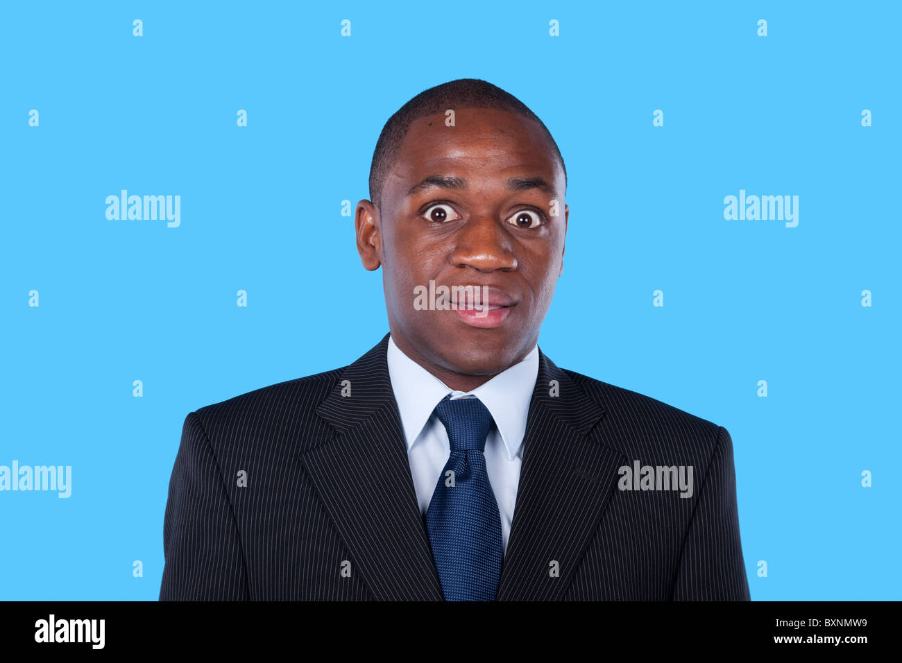 Shocked african businessman looking camera hi-res stock photography and ...