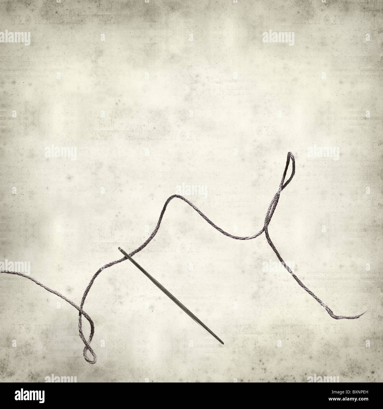 textured old paper background with sewing needle and tread Stock Photo ...