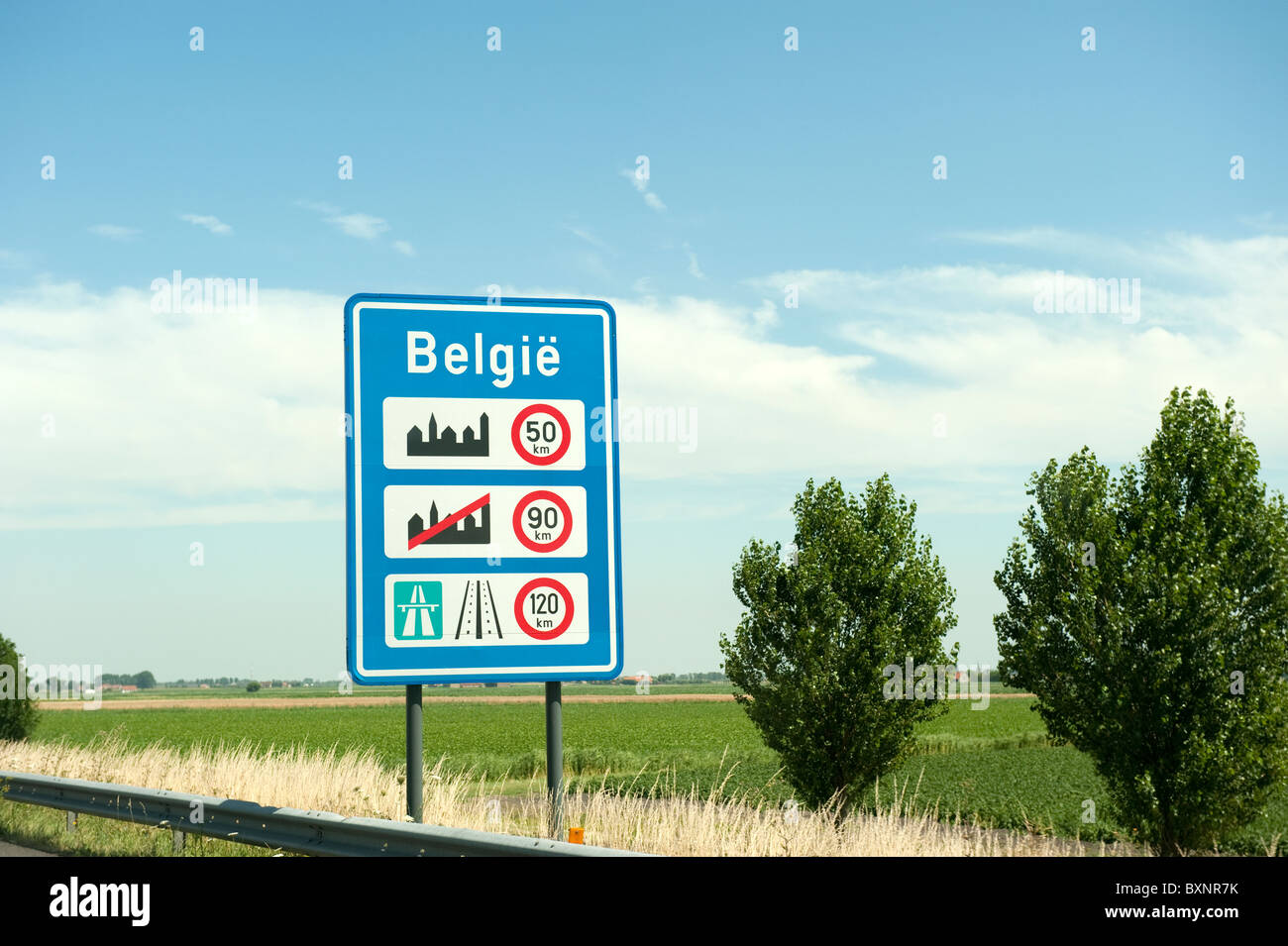 Belgium Border Road Sign with Speed Limits Stock Photo - Alamy