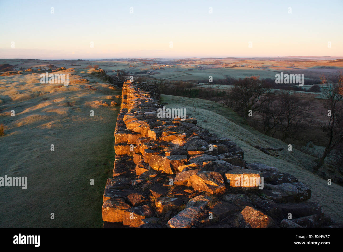 Hadrian's Wall at the top of Walltown Crags at sunrise on a frosty ...