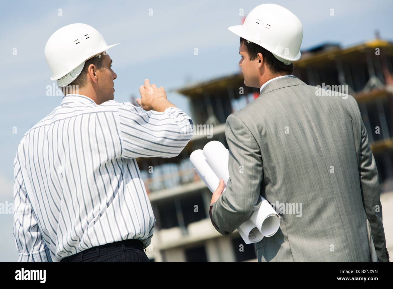 Show building site group people hi-res stock photography and images - Alamy