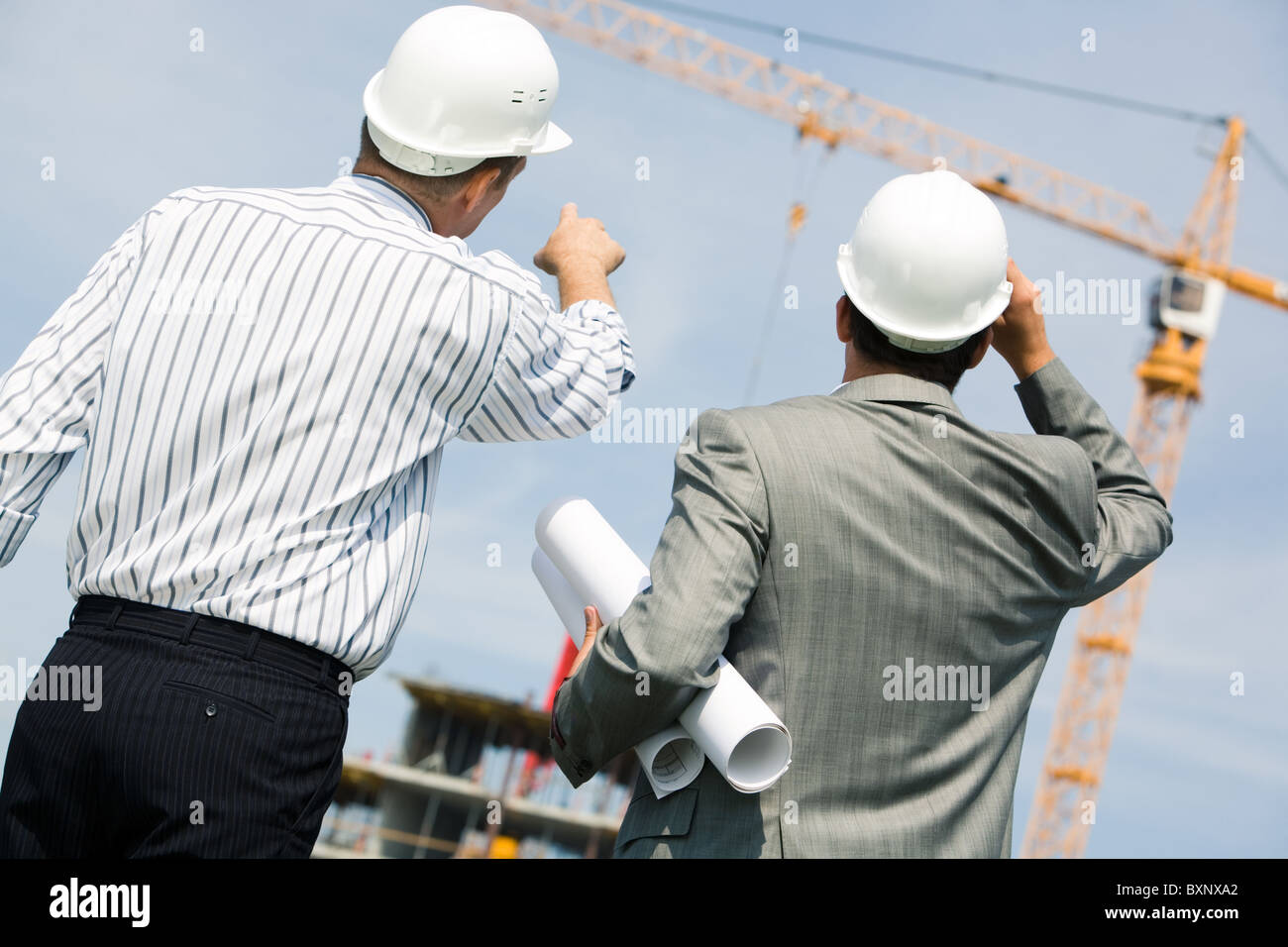 Show building site group people hi-res stock photography and images - Alamy
