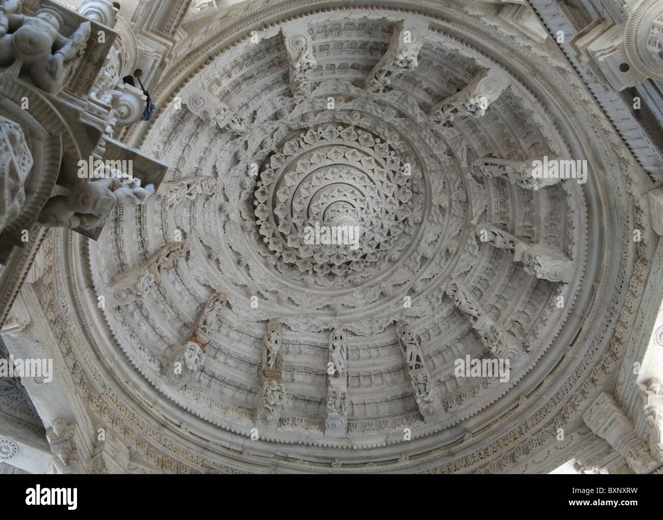 Intricate carved marble ceiling with gods and apsaras, Jain temple ...