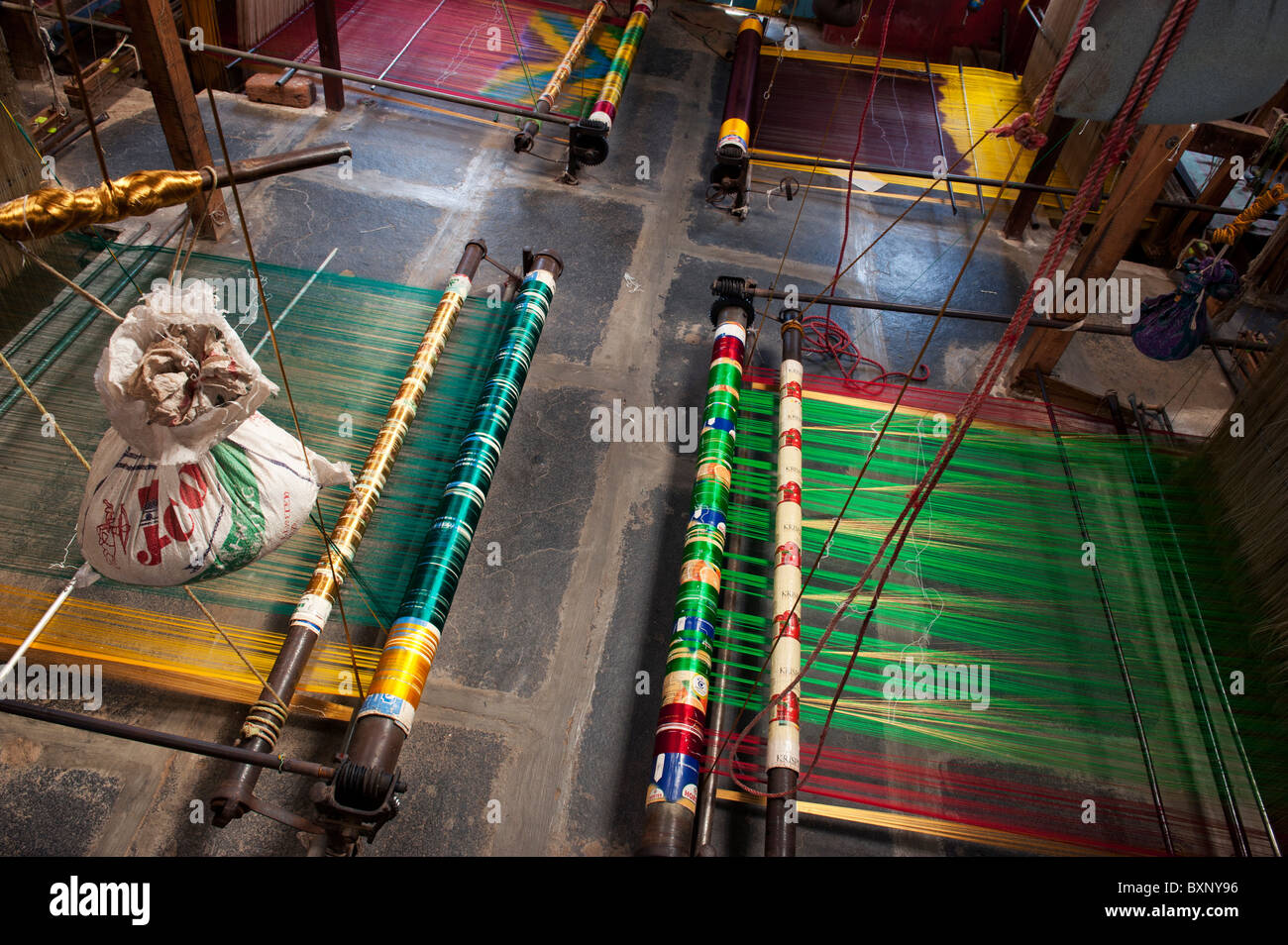 Hand loom making a silk sari in an Indian cottage. Andhra Pradesh ...