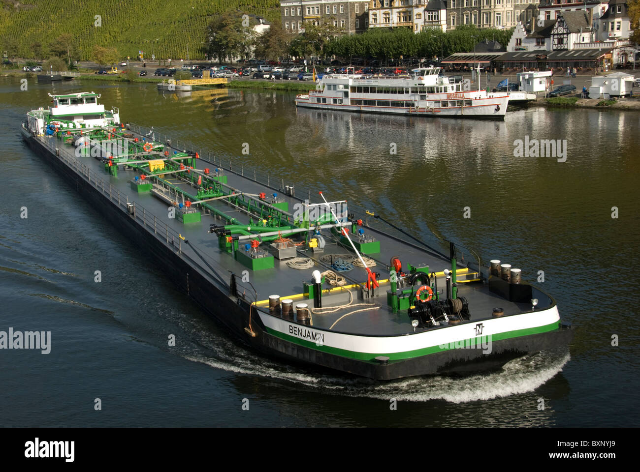 GERMANY; RHINELAND PFALZ; WORKING BARGE PASSING BERNKASTEL ON RIVER ...
