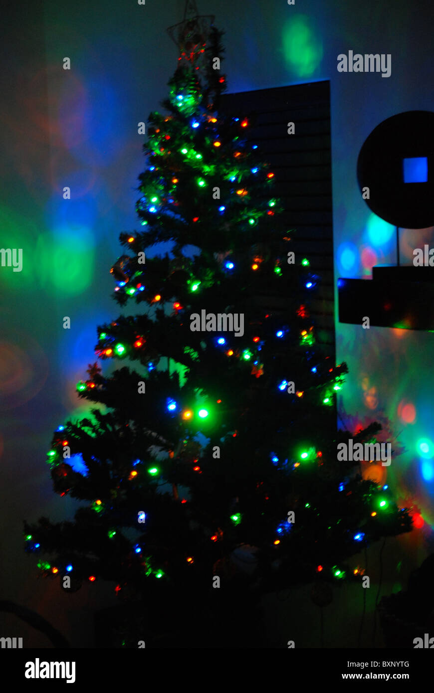 Christmas tree with colored lights Stock Photo - Alamy