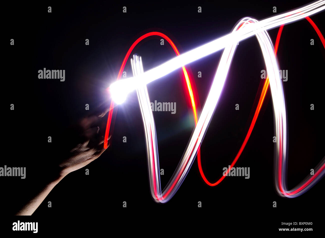 A light painting of a hand with light coming out of the finger Stock ...