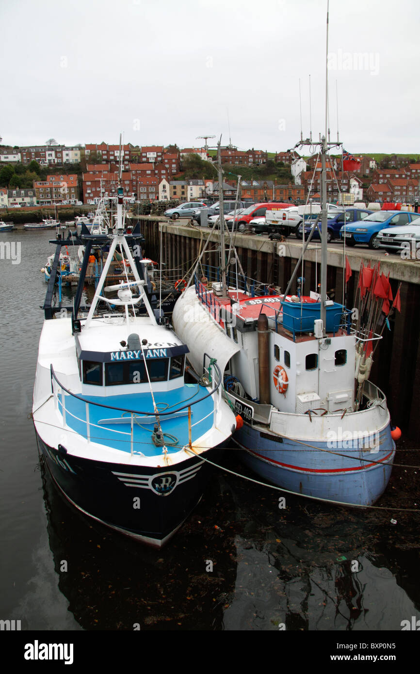Whitby harbour fishing red trawler hi-res stock photography and images ...