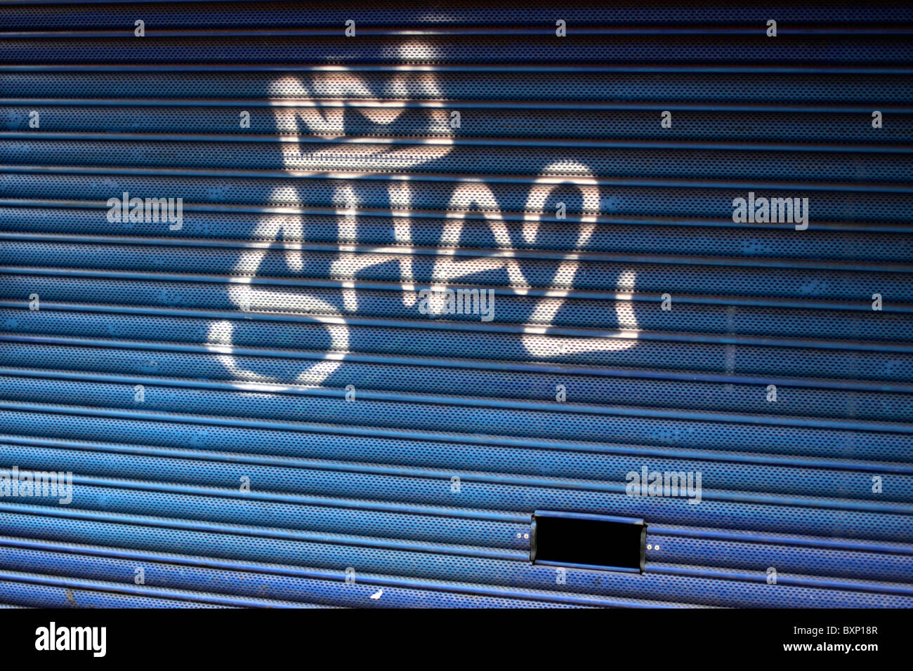 Graffiti tagging on a shop shutter in East London Stock Photo - Alamy
