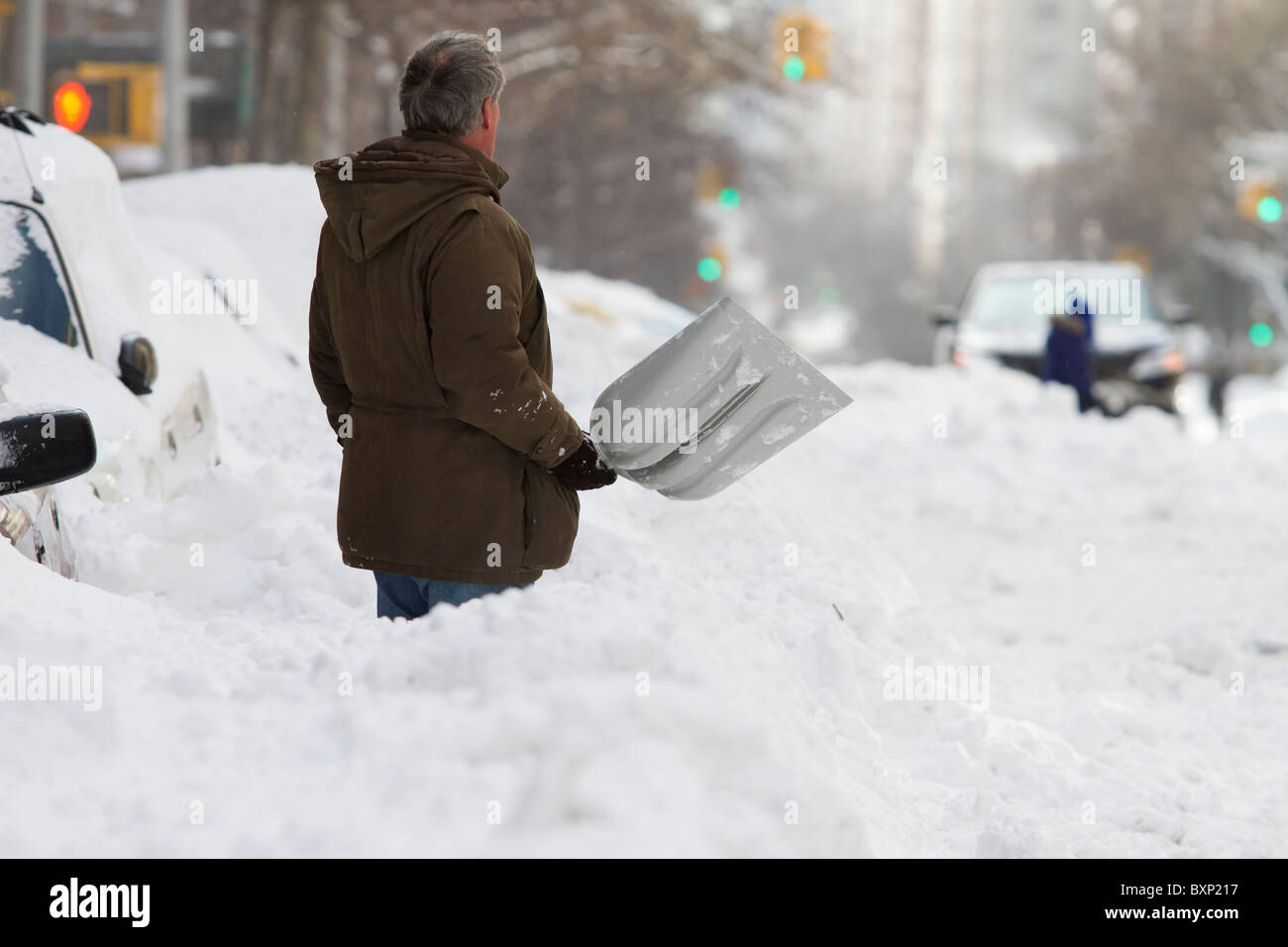 Digging car out of snow hi-res stock photography and images - Alamy