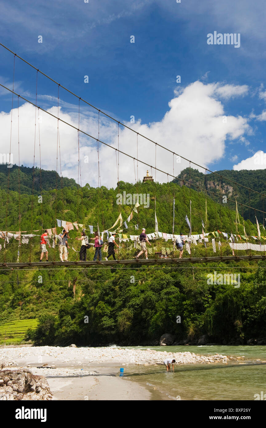 prayer flags on a suspension bridge, Punakha, Bhutan, Asia Stock Photo ...