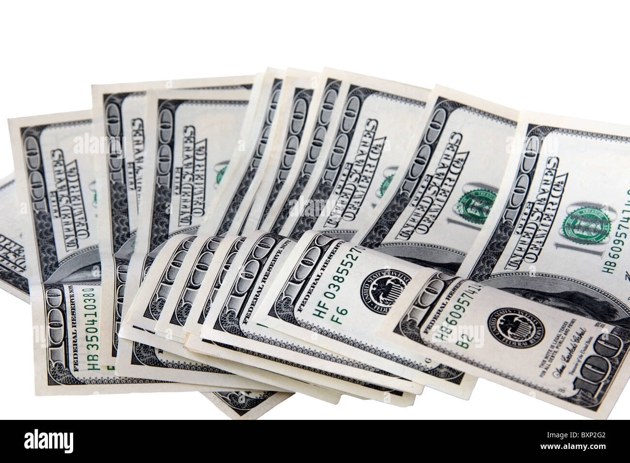 Lot of US dollars isolated on a white background Stock Photo - Alamy