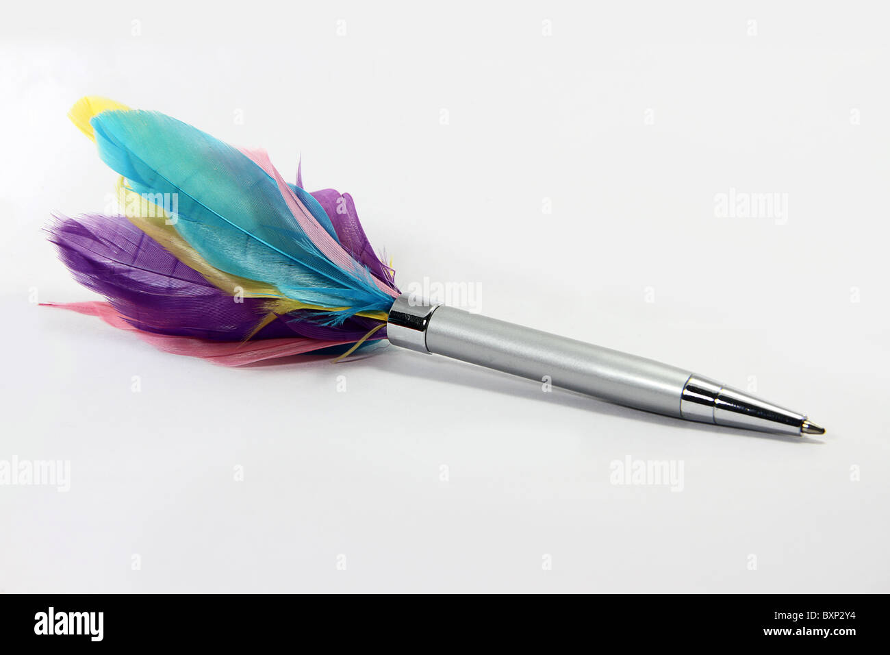 Pen with feathers Stock Photo - Alamy