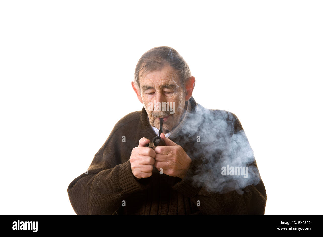 Colour picture of a senior smoking a pipe Stock Photo - Alamy