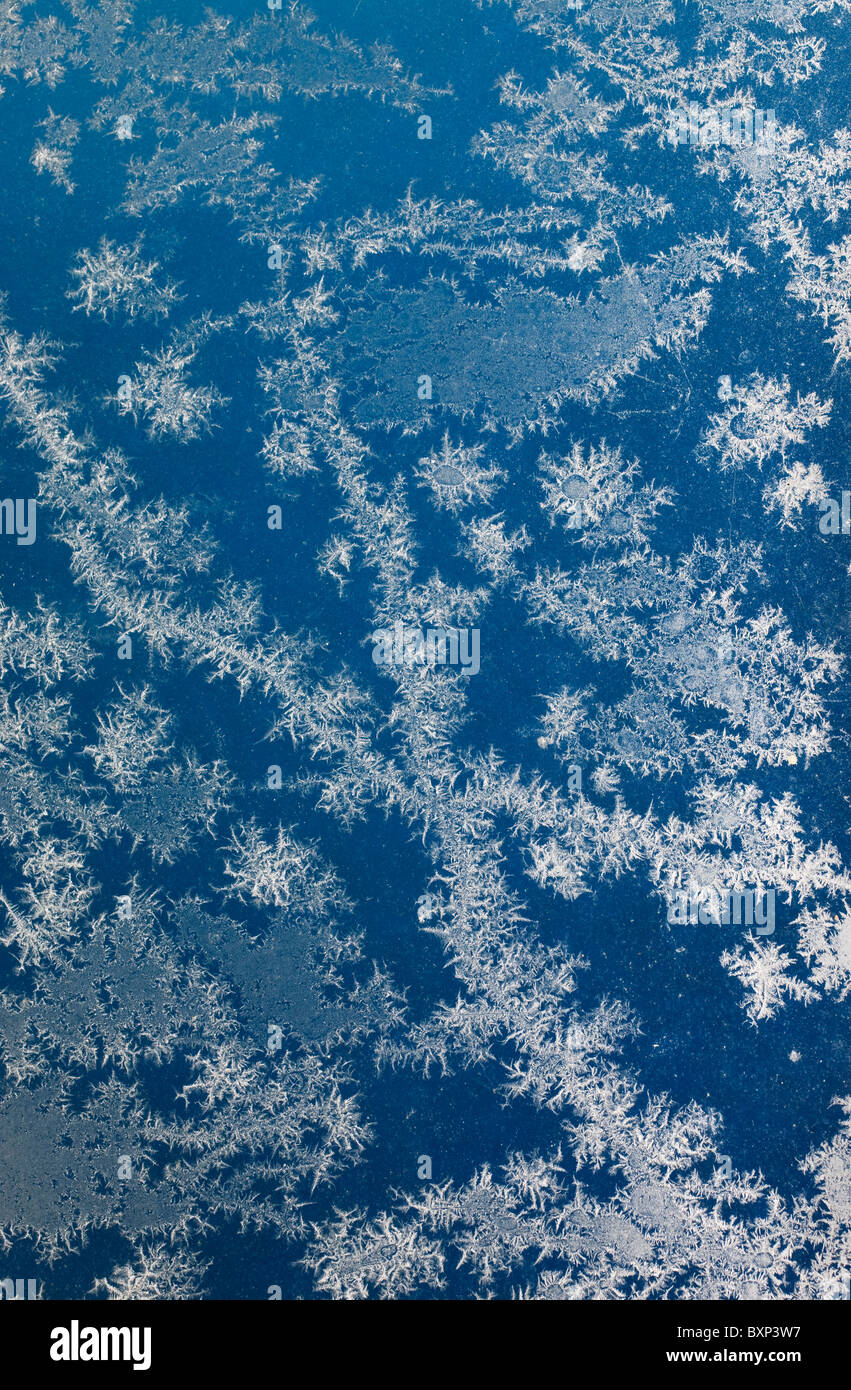 Frost patterns on glass Stock Photo - Alamy