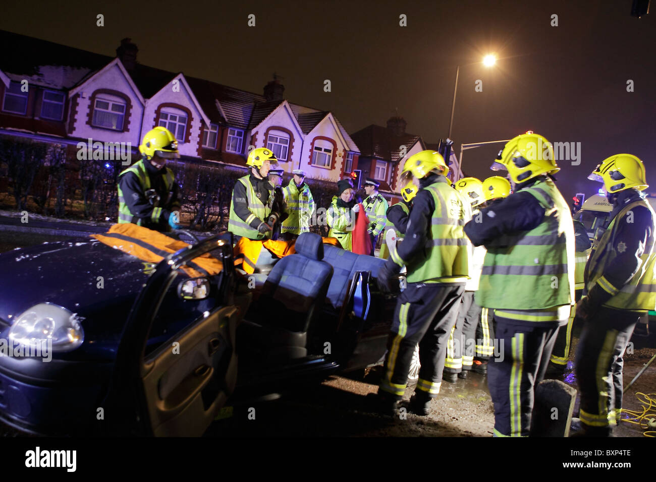 Emergency services treating a crash victim Stock Photo - Alamy