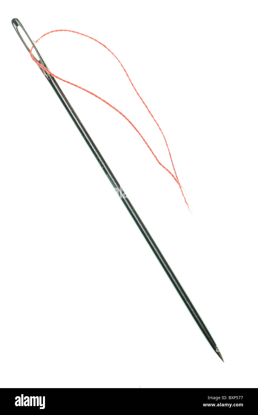 Needle threaded with red thread Stock Photo - Alamy