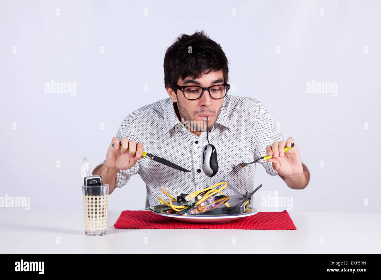 Eating technology hi-res stock photography and images - Alamy