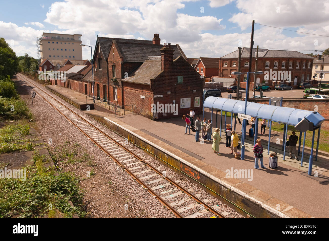 People waiting to catch a train at the station in Beccles , Suffolk ...