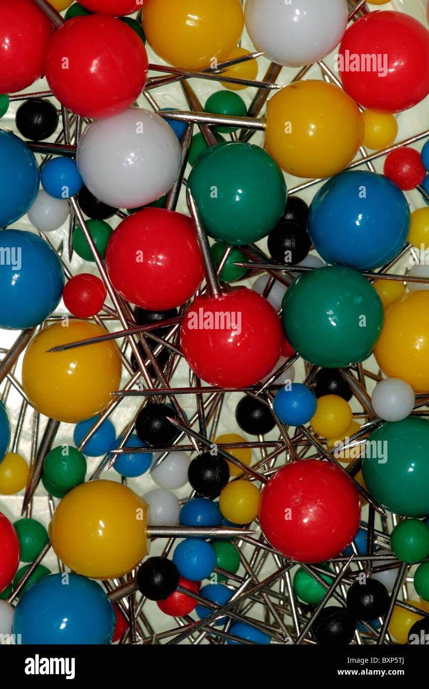 Map pins in various colours and sizes in close up Stock Photo - Alamy