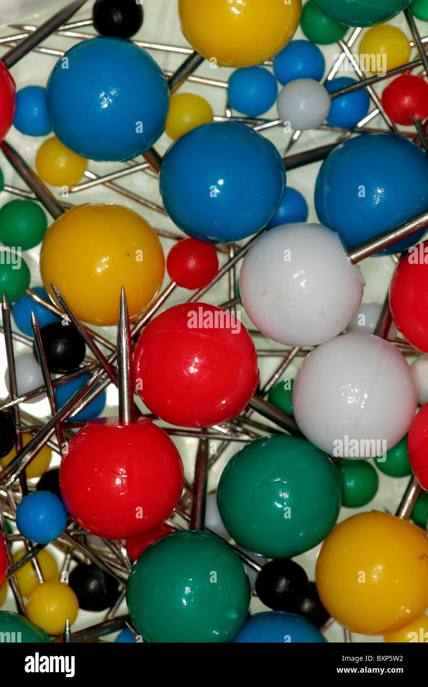 Map pins in various colours and sizes in close up Stock Photo - Alamy