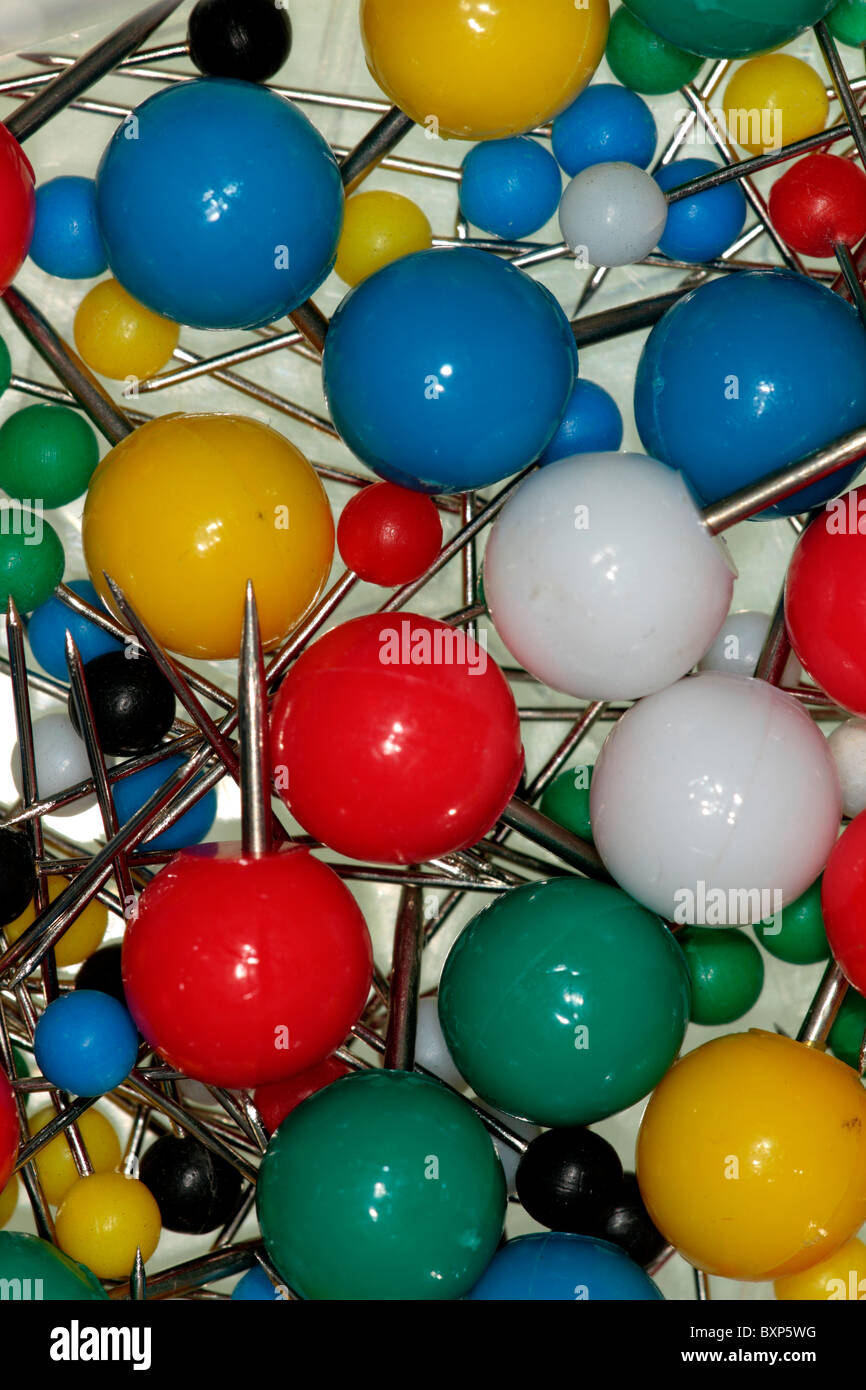 Map pins in various colours and sizes in close up Stock Photo - Alamy