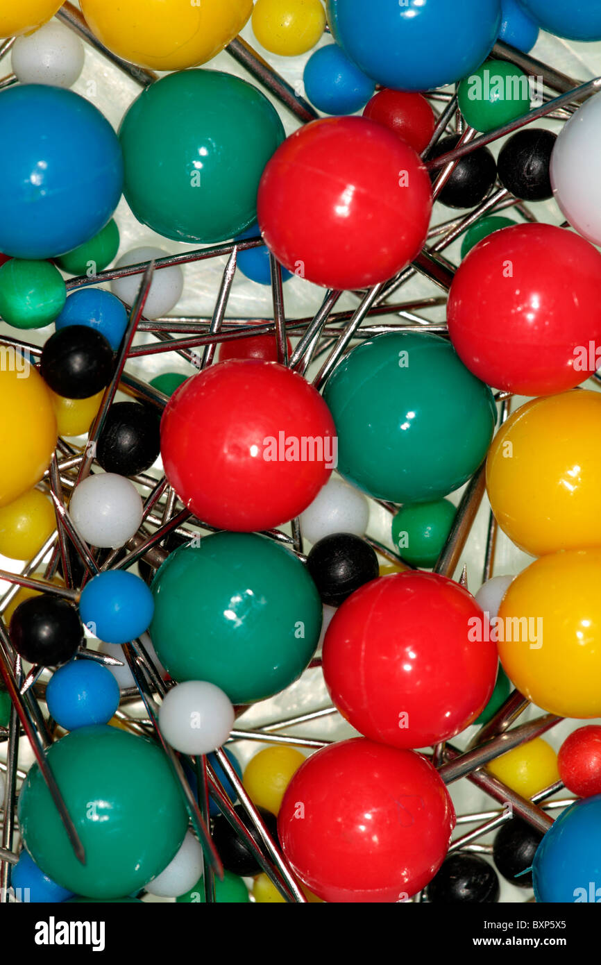 Map pins in various colours and sizes in close up Stock Photo - Alamy
