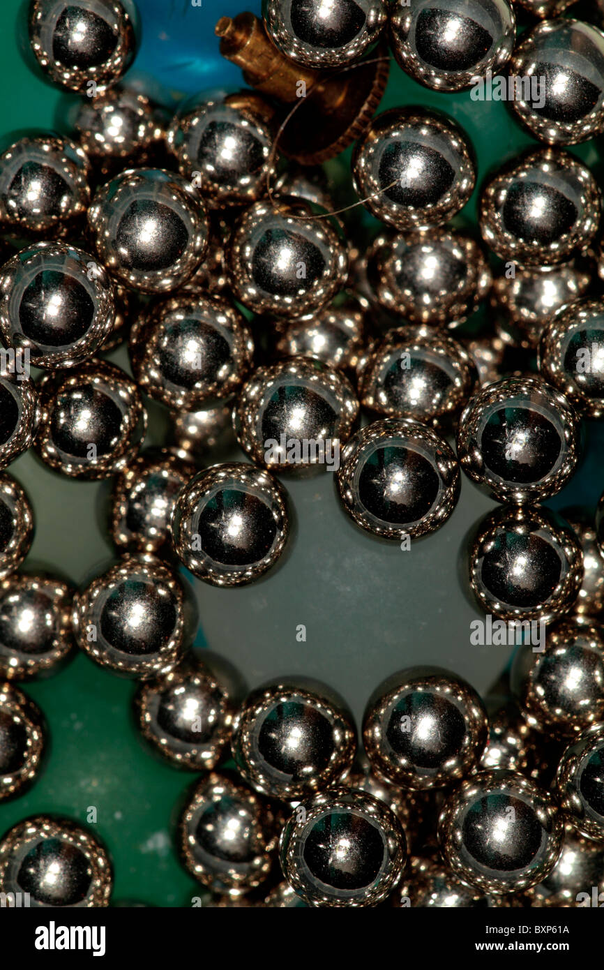Pale blue and green marbles, ball bearings in close-up Stock Photo - Alamy
